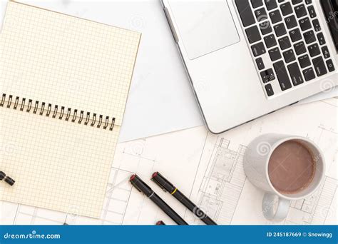 Mockup Of Architectural Concept Drawing Tools And Hot Coffee On Engineer Drawing Of Blueprint