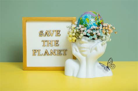 Save The Planet Text With World Globe In Head With Flowers Environment For The Future Concept