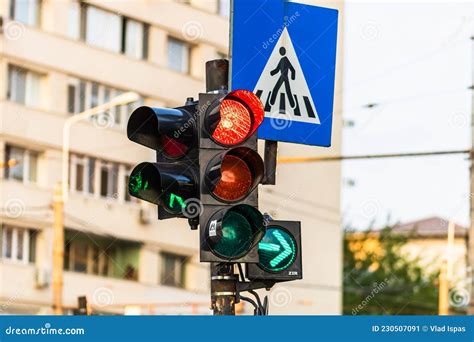 Red Signal Of Semaphore And Stop Sign In Front Of Railroad Crossing With Train Passing Royalty