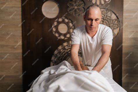 Premium Photo Portrait Of Professional Male Masseur Performing