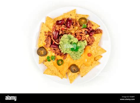An Overhead Photo Of Nachos With Cheese Chilli Con Carne And Guacamole