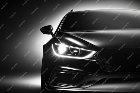 Premium Photo Shiny Black Car Polished With Dark Isolated Background