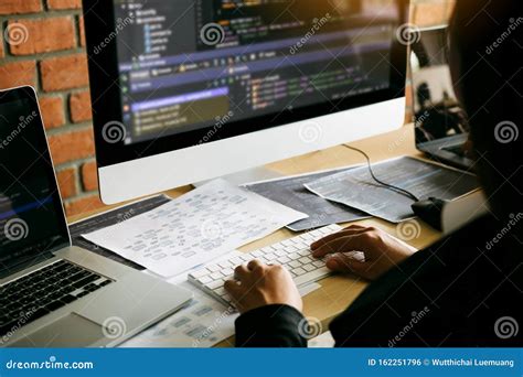 Two Partnerships Developing Programming And Coding Technologies Working On Laptop And Analyzing