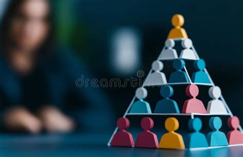 Colorful Pyramid Structure Made Of Figures Representing People