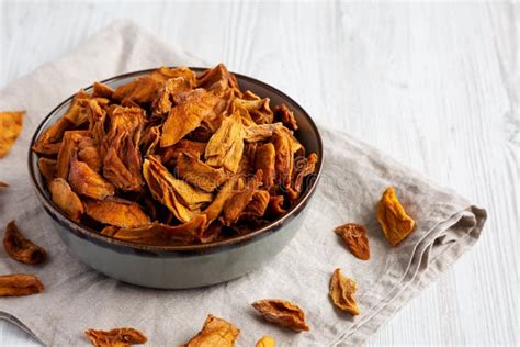 Delicious Organic Dried Mango Fruit In A Bowl Side View Space For