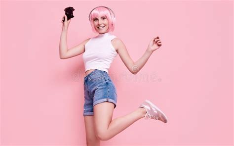Gorgeous Happy Blonde Gamer Girl Playing Video Games Using Joystick