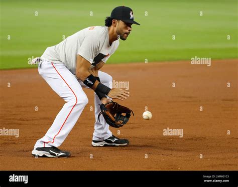 Miami Marlins Yadiel Rivera Fields A Ball During Batting Practice Before The Start Of A