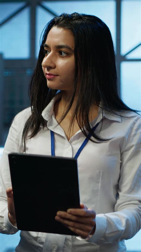 Vertical Admin In Data Center Monitoring Security Threats With Tablet