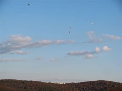 Безплатна снимка пейзаж море природа планина небе балон с горещ въздух заобикаляща среда