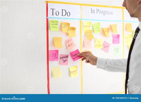 Man With Sticker Near Scrum Task Board In Office Stock Image Image Of Management Execute