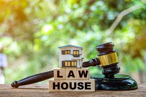 Legal Issues In Real Estate Transactions A Small Model House And A Judge S Gavel Stock Image