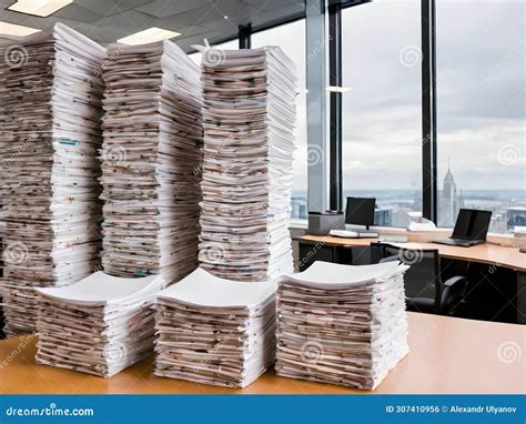 Pile Of Unfinished Documents On Office Desk Stack Of Business Paper