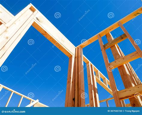 wooden exterior and interior walls framing house with rough openings