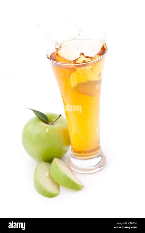 Apple juice and ice Stock Photo - Alamy