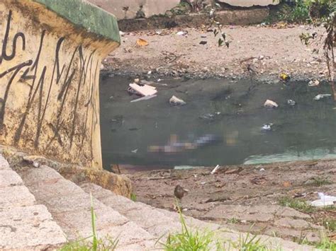 Mulher sinais de espancamento é encontrada morta dentro de rio em