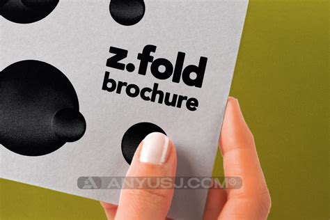 Z Vi Psd Hand Holding Folded Psd Brochure Mockup