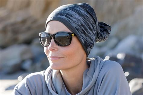 Premium Photo Confident Woman In Sunglasses And Headscarf Outdoors