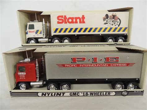 Nylint Gmc 2 Tandem Axle Tractors W Tandem Axle Box Trailers Including P I E And Stant 21