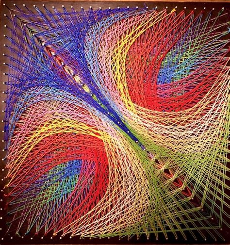 An Abstract Art Work With Many Colors And Lines In The Shape Of A