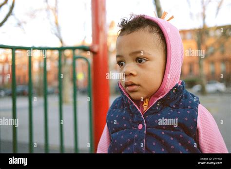 Serious Mixed Race Girl Stock Photo Alamy