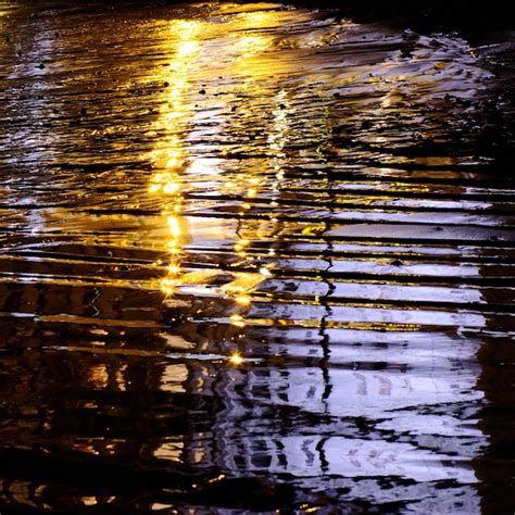 Premium Photo High Angle View Of Rippled Water With Reflection On Shore