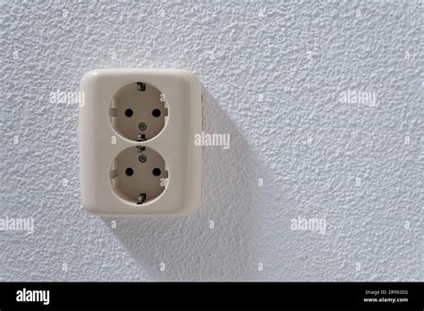 Surface Double Socket At White Wall Stock Photo Alamy