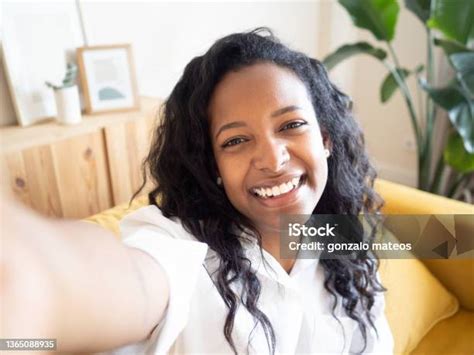 Pov Of A Smiling Young Latin American Woman Taking A Selfie In Her New
