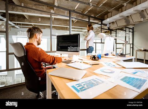 Man As A Programmer Working With Computer Code Sitting At The Beautiful