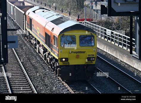 A Freightliner Class 59 Locomotive Standing At A Set Of Signals Just
