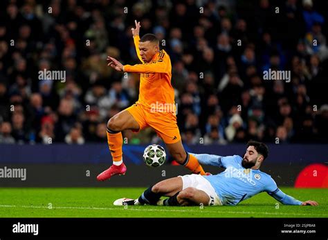 Real Madrids Kylian Mbappe Is Tackled By Manchester Citys Josko