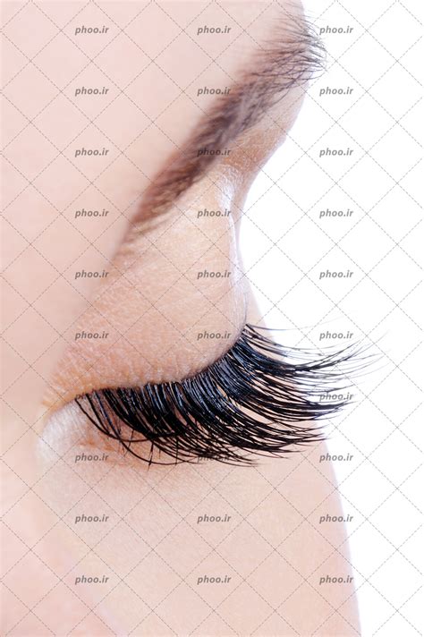 عکس از چشم زن با مژه های بلند از نمای نزدیک عکس با کیفیت و تصاویر