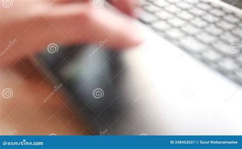 Businessman Scrolling On A Laptop Keyboard In Blurred Focus Stock Video Video Of Desk
