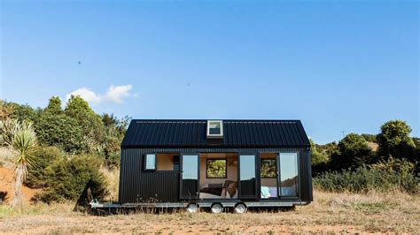 K Everest Tiny House Has Mezzanine Lounge Main Floor Bedroom