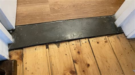 Hardwood Floor How To Neatly Cover Gaps In Threshold Plate Between Rooms Home Improvement