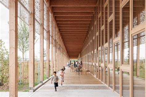 Atelier Woa Creates Long Timber Framed Library In France