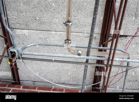 Old Ceiling Mounted Glass Drain Vent Pipes In School Science Room Or