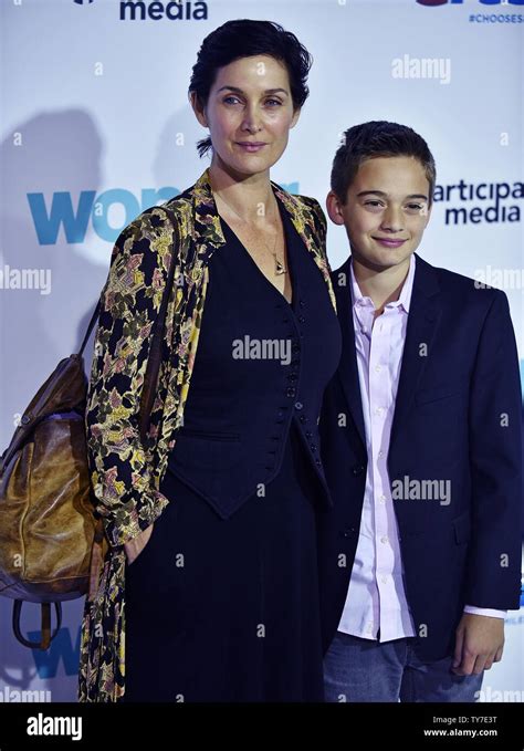 Carrie Anne Moss And Her Son Jaden Roy Arrive For The Premiere Of