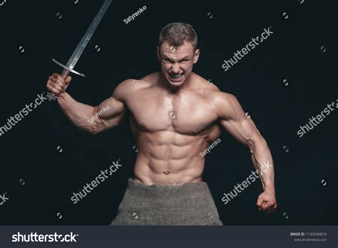 Bodybuilder Man Posing Sword Isolated On Stock Photo Shutterstock