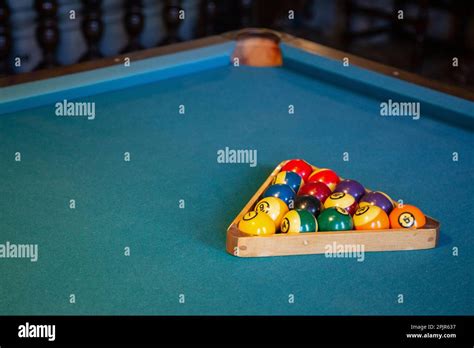 billiard balls on green table with billiard cue snooker pool game