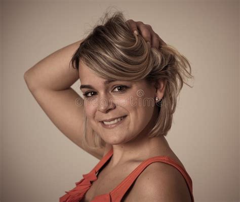Portrait Of An Attractive Woman With Happy And Smiling Face In Beauty