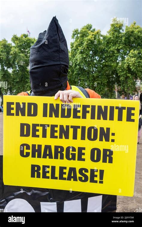 Protesters Have Donned Orange Overalls And Held Placards And Banners