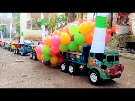 MOBIL TRUK KONVOI BAWA BOLA WARNA WARNI TRUK OLENG MOBIL TRUK