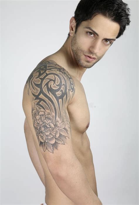 Shirtless Muscular Tattooed Man Isolated On White Background Stock