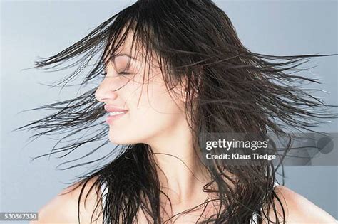 Woman Shaking Wet Hair Photos And Premium High Res Pictures Getty Images