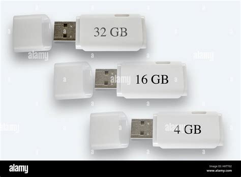 White Usb Memory Sticks Gb Gb And Gb On White Background With Their Lids Off Stock