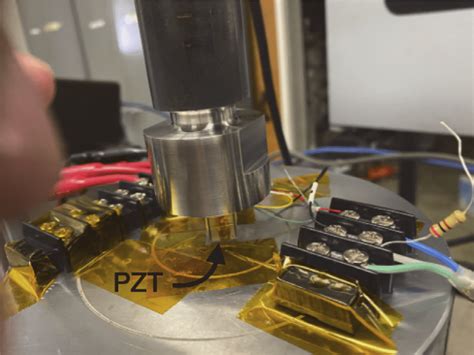 Pzt Installed In The Instron Jig Between Two Compression Platens The