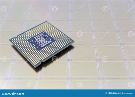 Photo Of A Computer Chip CPU Put On Silicon Wafer With Microchip Stock