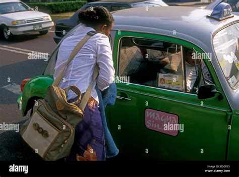 Mexican Woman Getting Into Taxi Mexican Woman Taxi Ride Green Vw Bug