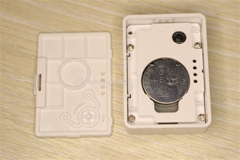Disassembled Electronic Device Featuring A Battery Compartment For
