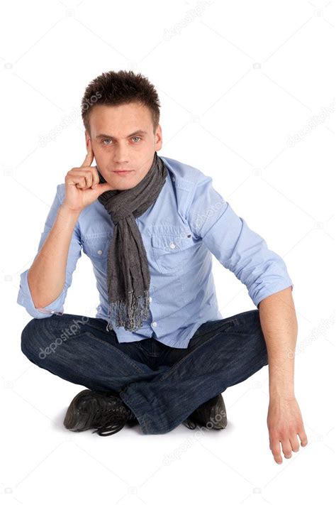 Thoughtful Man Sitting With Legs Crossed Stock Photo Rognar